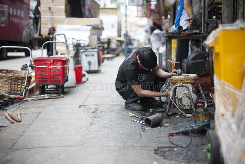 Mechanic busy with work editorial stock image. Image of asia - 83133834