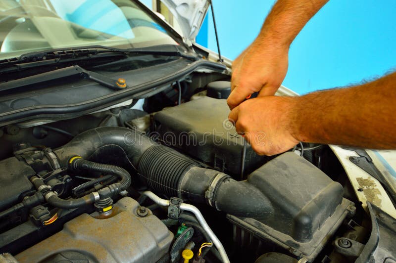 Car Mechanic Working in Auto Repair Service. Stock Image - Image of ...