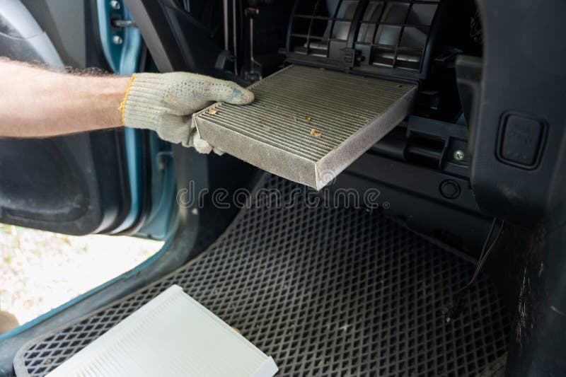 A Mechanic Changes the Cabin Air Filter of a Car. Stock Photo - Image ...