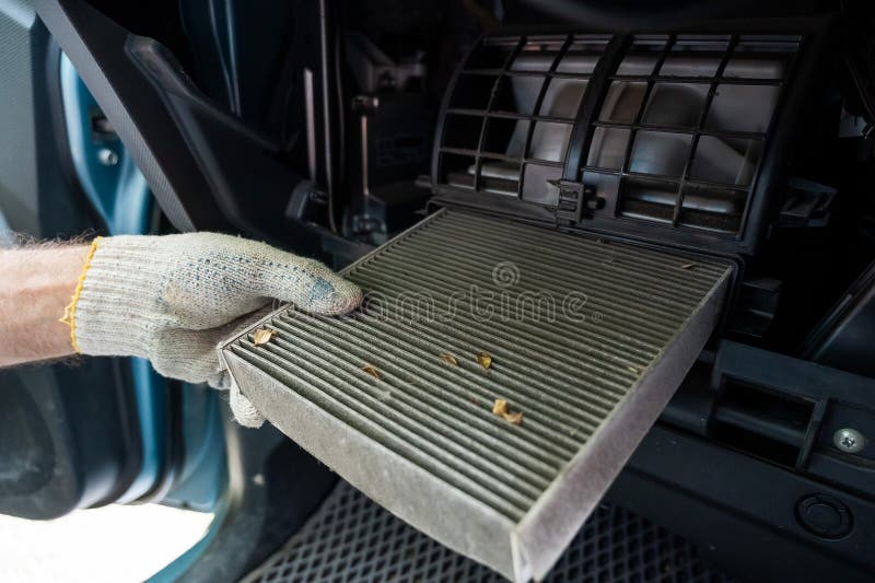 A Mechanic Changes the Cabin Air Filter of a Car. Stock Photo - Image ...