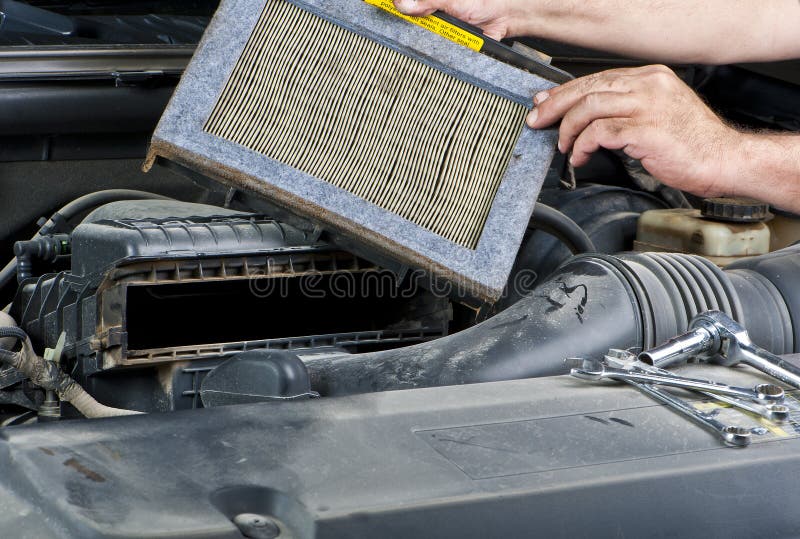Mechanic Changing Car Filter Stock Photo - Image of person, automobile ...