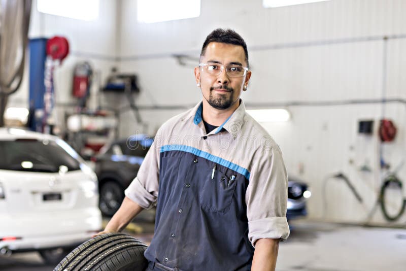 Handsome Mechanic Job in Uniform Working on Car Stock Image - Image of ...