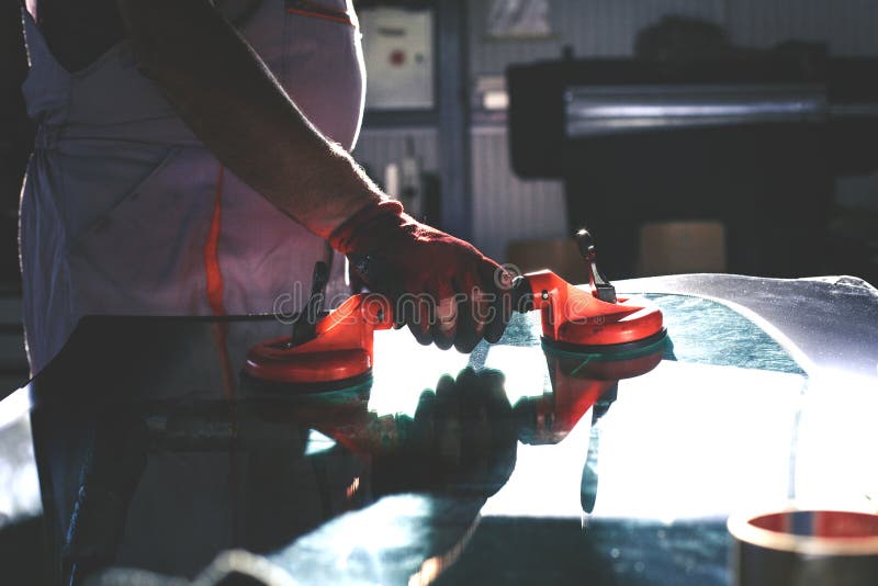 Mechanic Changing Glass in His Workshop. Stock Image - Image of adult ...