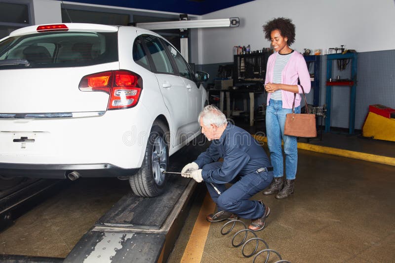 Mechanic Changing Tires while Driving Stock Photo - Image of ...