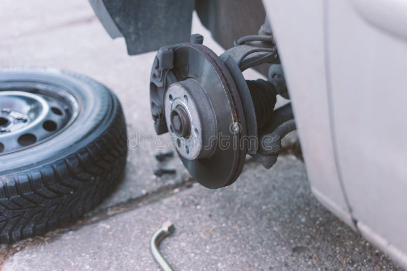Mechanic Changing a Wheel of a Car Stock Image - Image of tire, machine ...
