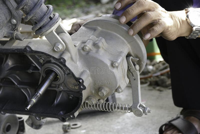 The Mechanic Check the Pulley and Belt of Motorcycle Stock Image ...