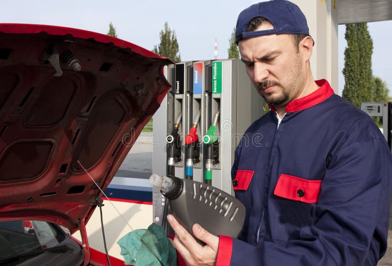 Mechanic Checking Engine stock image. Image of service - 16686289