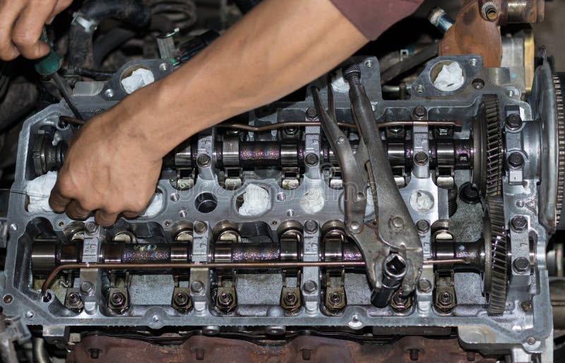 The Mechanic is Checking the Engine. Stock Photo - Image of gear, frame ...
