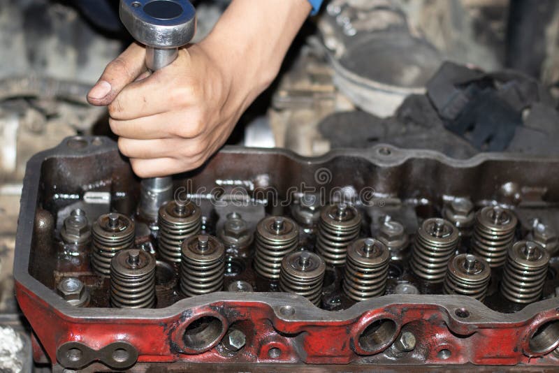 The Mechanic is Checking the Engine. Stock Image - Image of automotive ...