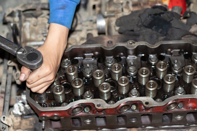 The Mechanic is Checking the Engine. Stock Image - Image of engineering ...