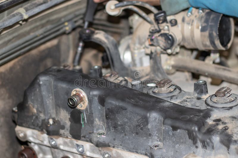 The Mechanic is Checking the Engine. Stock Image - Image of business ...