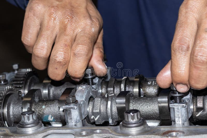 The Mechanic is Checking the Engine. Stock Photo - Image of charger ...