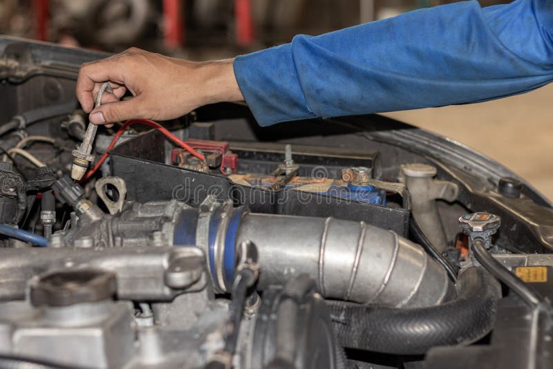 The Mechanic is Checking the Engine. Stock Photo - Image of gearbox ...