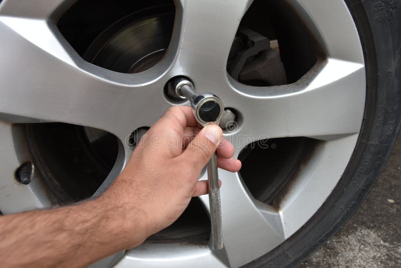 Mechanic Checking and Fixing a Broken Car in Car Service Stock Photo ...