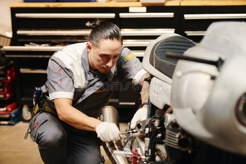 Mechanic Checking Motorcycle Wiring Stock Image - Image of bike, check ... Mechanic Checking Motorcycle Wiring Stock Image - Image of bike, check ...