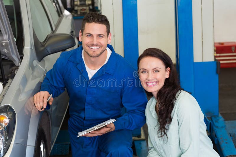 Mechanic and Customer Smiling at Camera Stock Photo - Image of wear ...