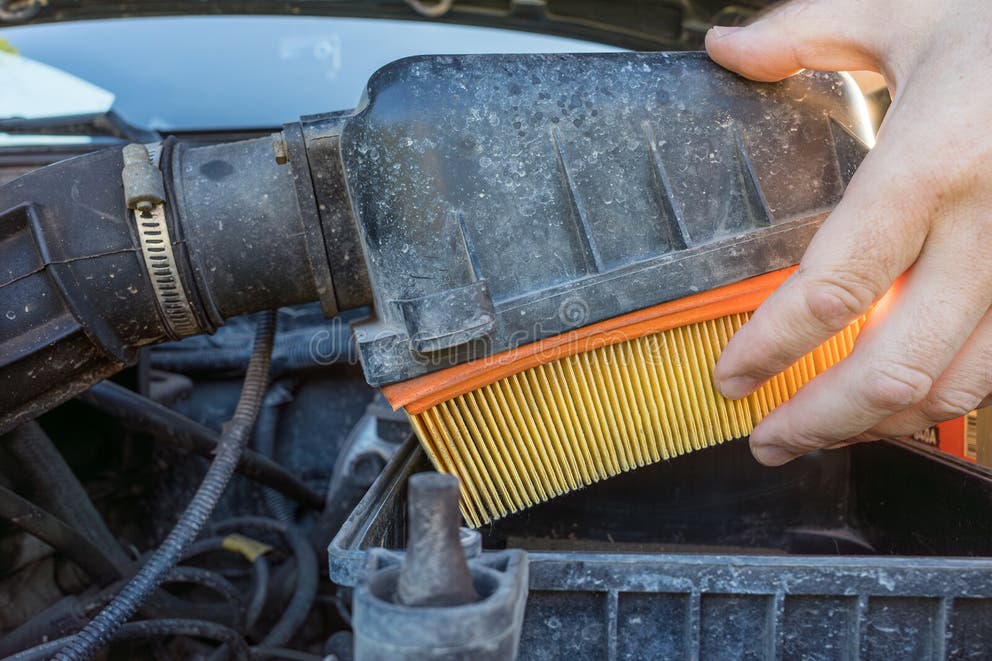 Mechanic Disassembles the Engine Air Filter Cover. Inter-service ...