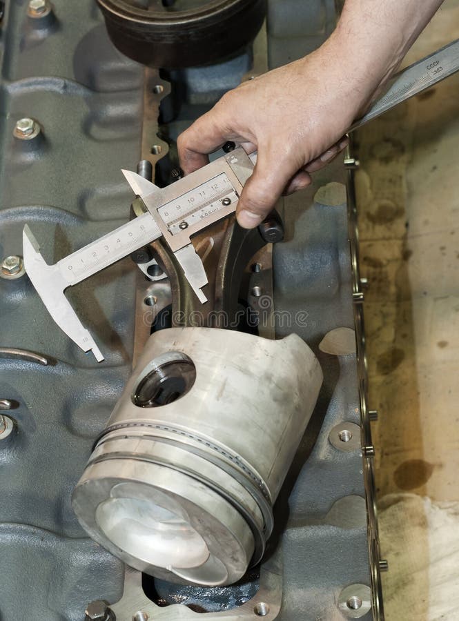 The Mechanic Does Detail Measurement before Engine Repair Stock Image ...