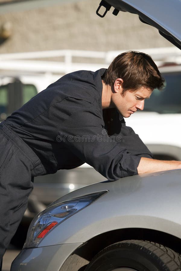 Car Mechanic Fixing Parts of Automobile Stock Photo - Image of ...