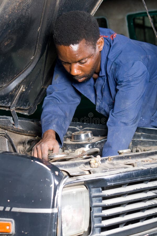 Car Mechanic Fixing Parts of Automobile Stock Photo - Image of ...