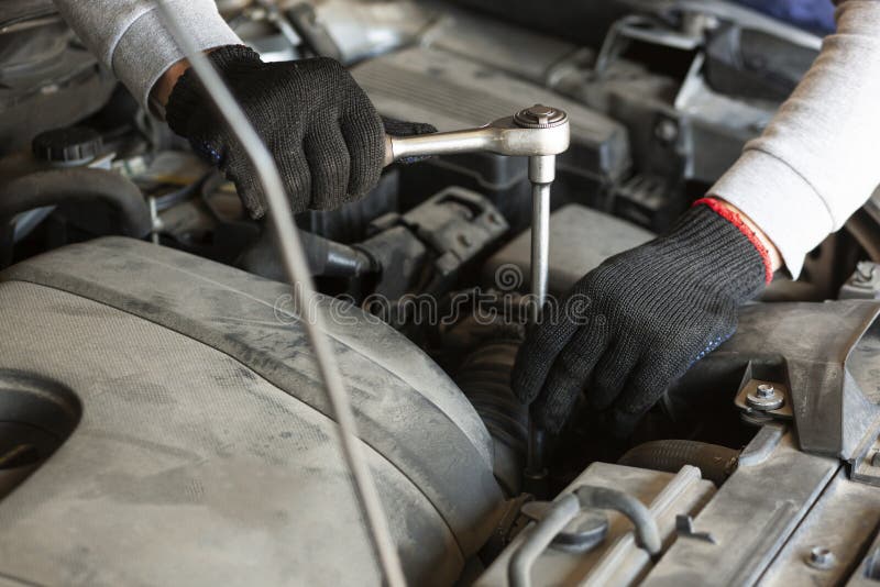The Mechanic Fixing the Car Stock Photo - Image of inspection, check ...