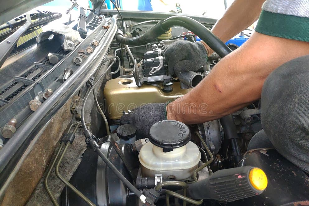 The Mechanic is Fixing the Engine Stock Image - Image of fixing ...