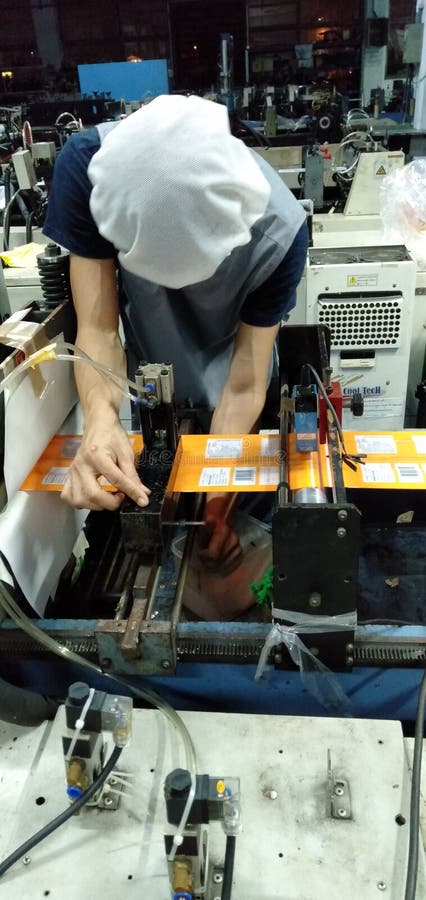 Mechanic of Food Envelope Sealer Editorial Photo - Image of sous, green ...
