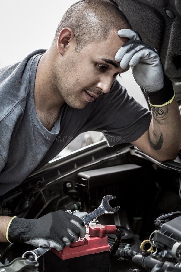 Mechanical Hand Checking and Fixing a Car Stock Photo - Image of motor ...