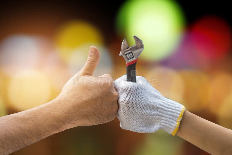 Mechanic Hand Checking and Fixing a Broken Car in Garage.hand of ...