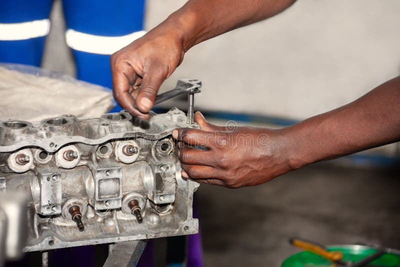 Mechanic hands stock photo. Image of hands, engine, africa - 161898660