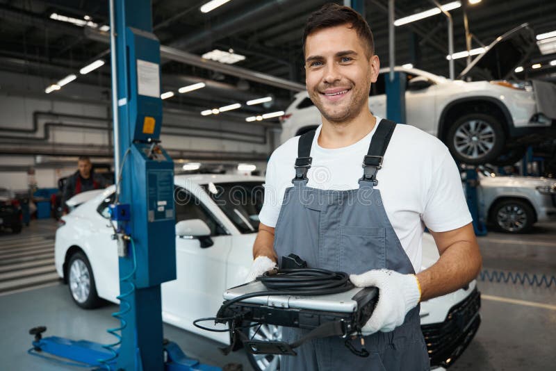 Mechanic is Holding Instruments, Ready for Work Stock Image - Image of ...