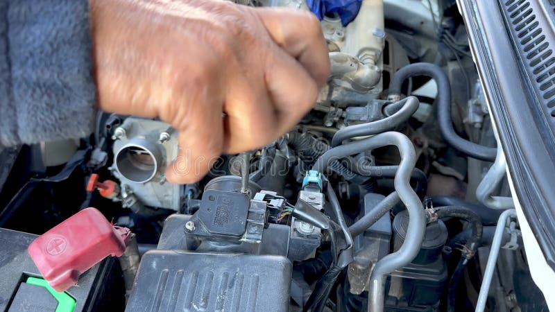 Mechanic Holding Intake Manifold Absolute Pressure Sensor (MAP Sensor ...
