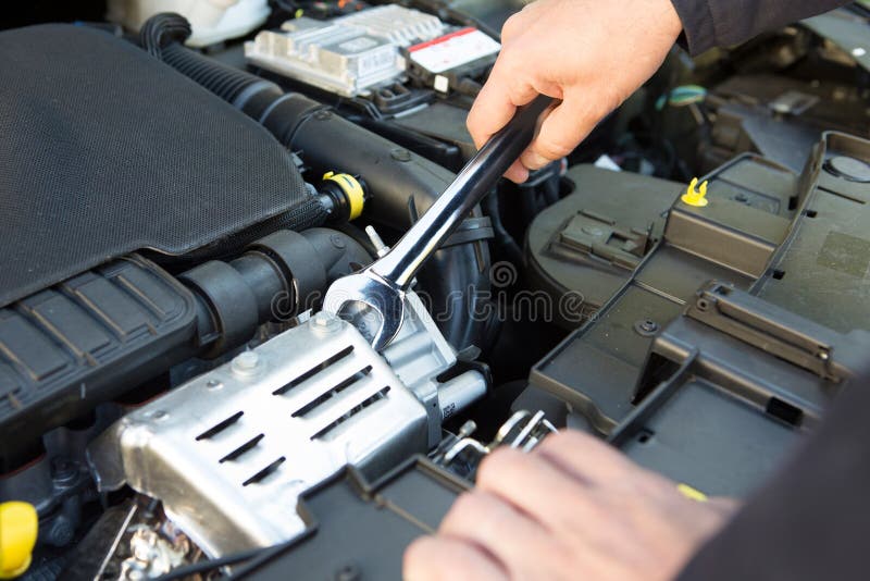 Mechanic Holding Spanner Fixing Car Engine Stock Image - Image of ...