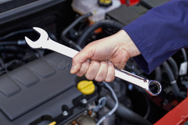 Mechanic Holding Spanner Fixing Car Engine Stock Image - Image of ...