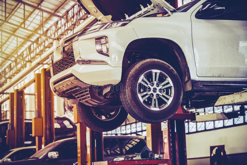 Mechanic Inspect Car Suspension System and Chassis Under the Car Stock ...