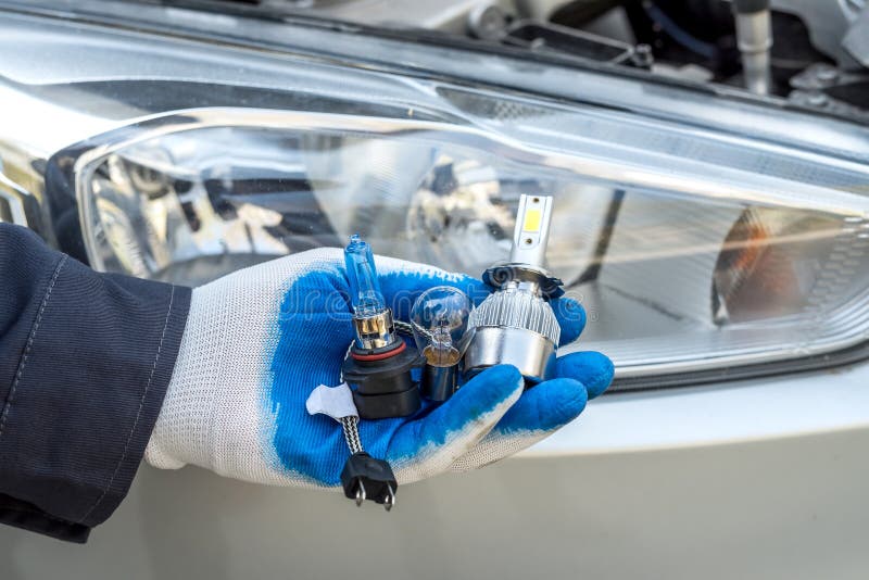 Mechanic Installing Changing Modern Halogen Headlight Bulb Stock Image ...