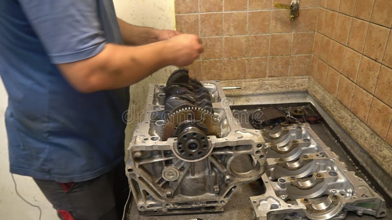 Mechanic Installing Engine Part Stock Video - Video of parts ...