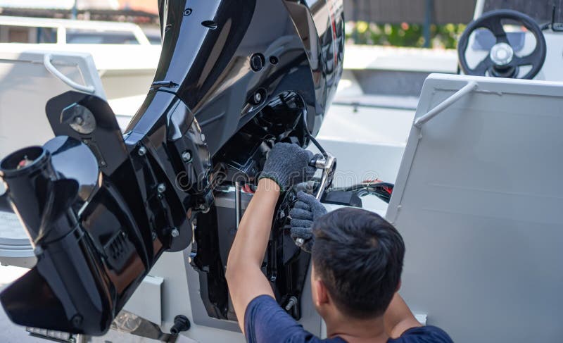 Mechanic is Installing Speed Boat Engine Stock Photo - Image of blue ...