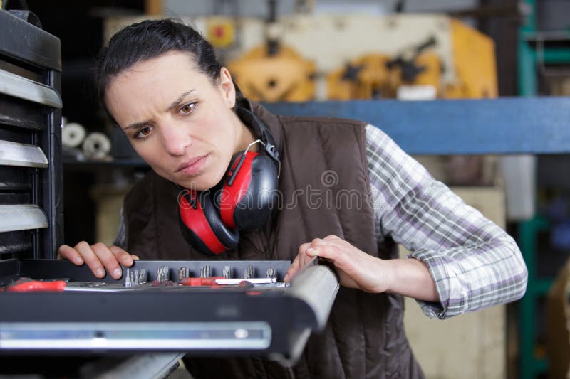 Mechanic Looking for Tool in Drawers at Repair Garage Stock Image ...