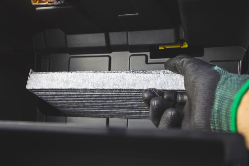 Mechanic Man Installing Car Air Conditioner Filter Put it on the Air ...