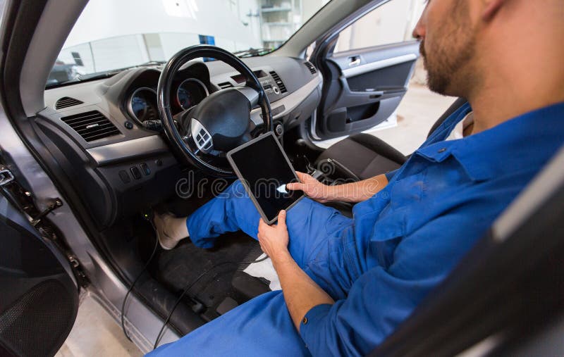 Mechanic Man with Tablet Pc Making Car Diagnostic Stock Photo - Image ...