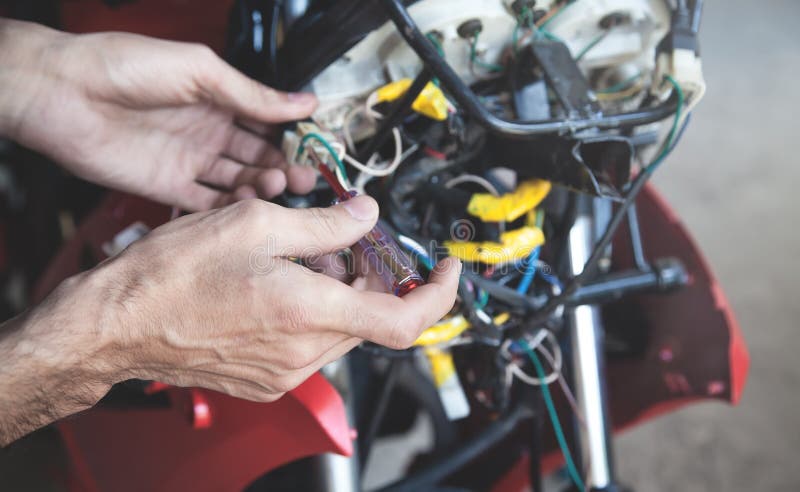 Mechanic Man Wiring the Electrical Cables Motorcycle Stock Photo ...