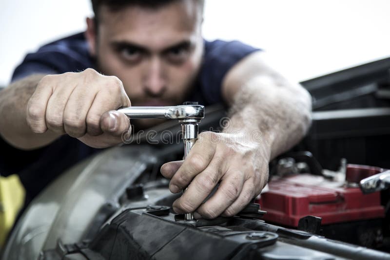 Mechanic man working stock photo. Image of handsome, close - 92686294