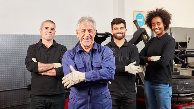 Mechanic and Mechatronics Team in Workshop Stock Image - Image of smile ...