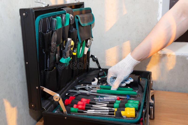 Mechanic Opens a Toolbox. Repair Tool Kit. Mechanic Chooses a Tool for ...