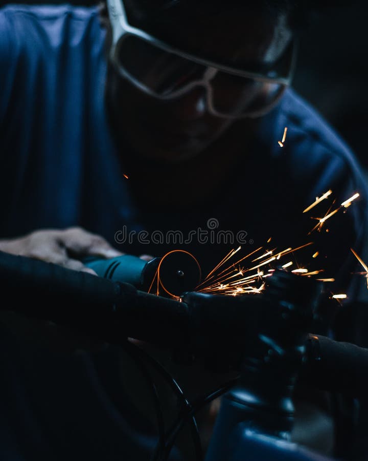 Mechanic Performing a Welding Cutting Torch with the Instruments in the ...