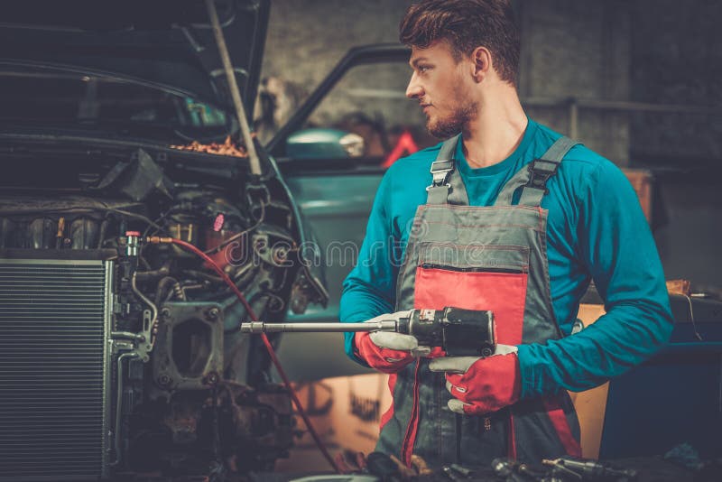 Mechanic with Pneumatic Tool Stock Image - Image of checking ...