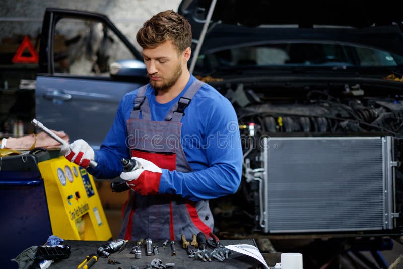 Mechanic with Pneumatic Tool Stock Photo - Image of repairman, motor ...