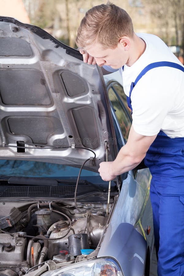 Mechanic Raising Up Car Hood Stock Image - Image of carefully, outdoors ...