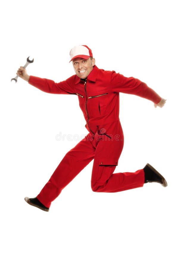 Mechanic in red Overall stock photo. Image of service - 30814750